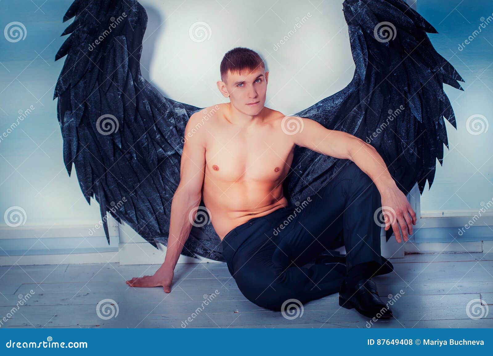 Cthe man with angel wings stock photo. Image of angels - 87649408