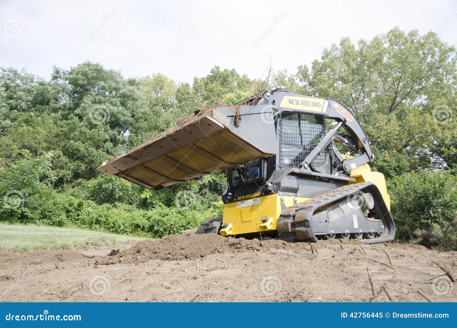 CTL Pushing Dirt editorial image. Image of asphalt, machine - 42756445