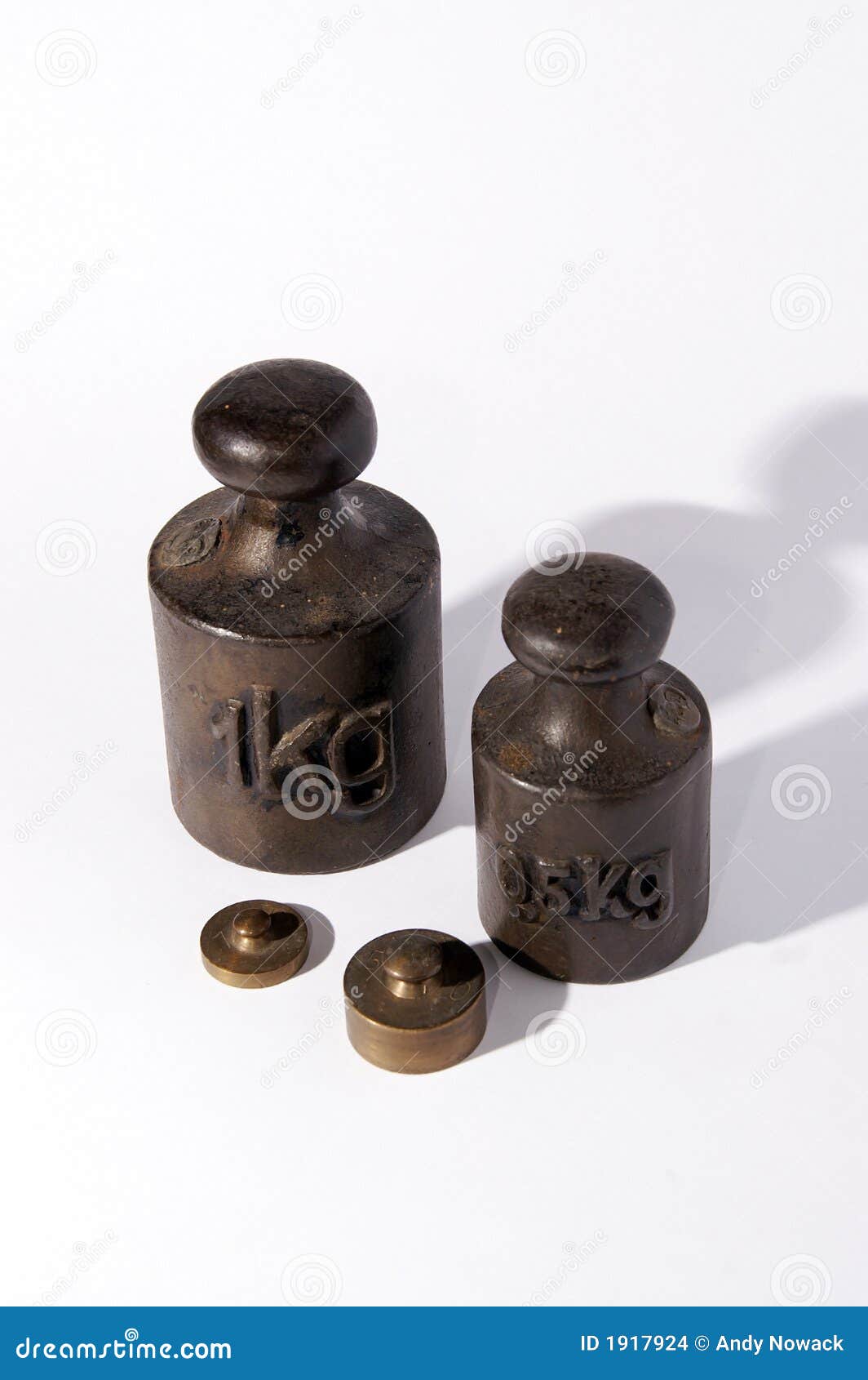Cuatro contrapesos foto de archivo. Imagen de medio, kilogramo - 1917924