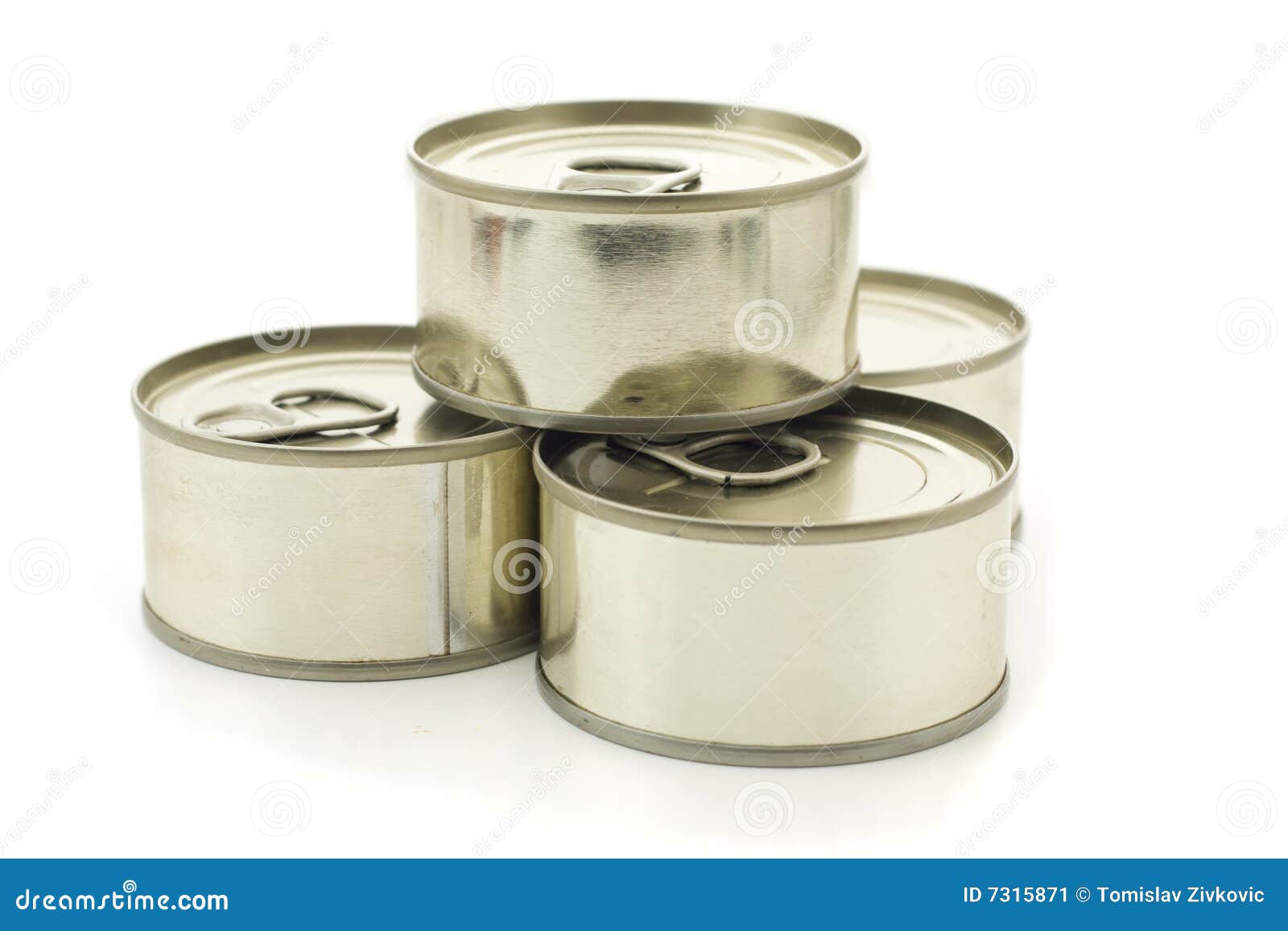 Cuatro latas del metal imagen de archivo. Imagen de brillante - 7315871