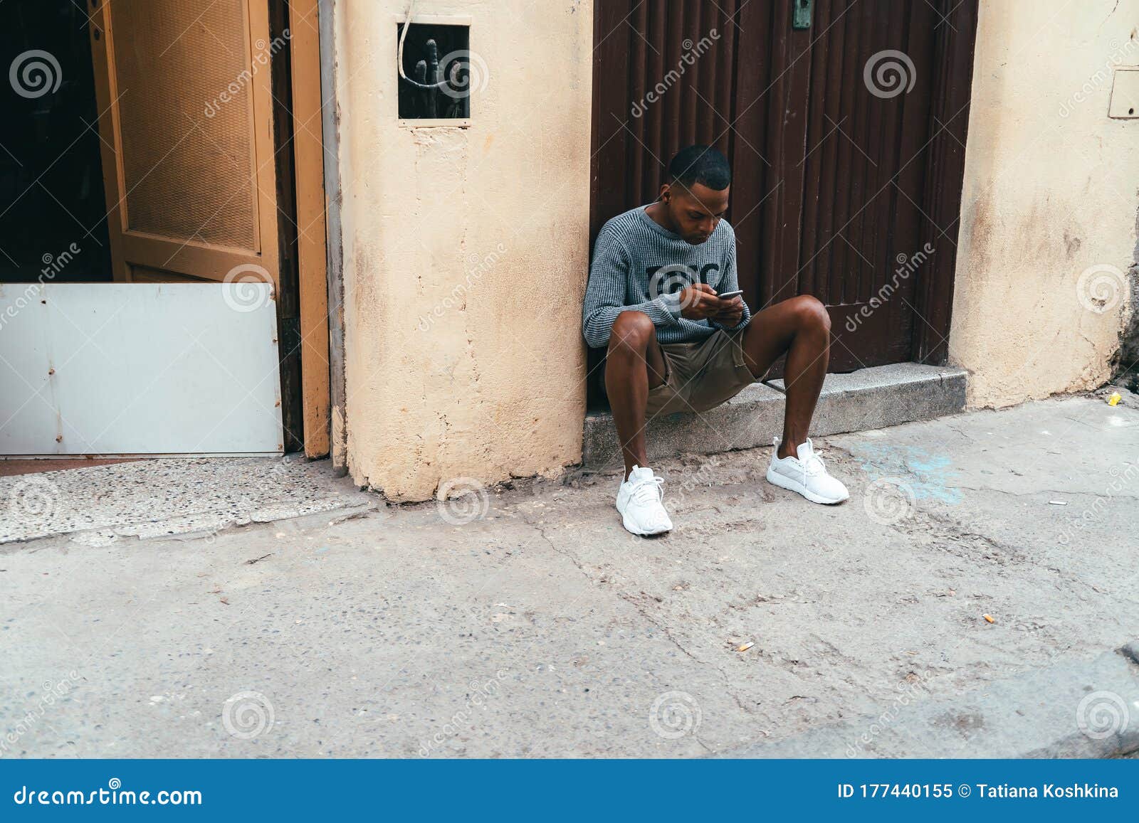 Cuban Guy Sits on the Steps of a House in Havana Editorial Image ...
