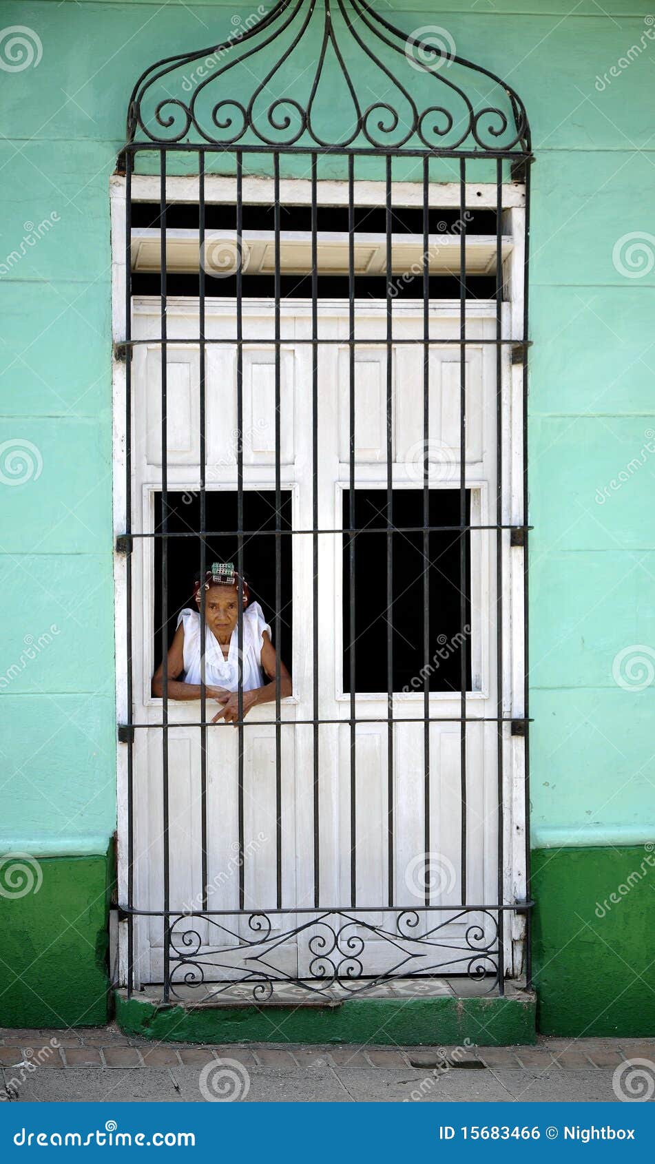 Cuban woman at the window editorial photo. Image of traditional - 15683466