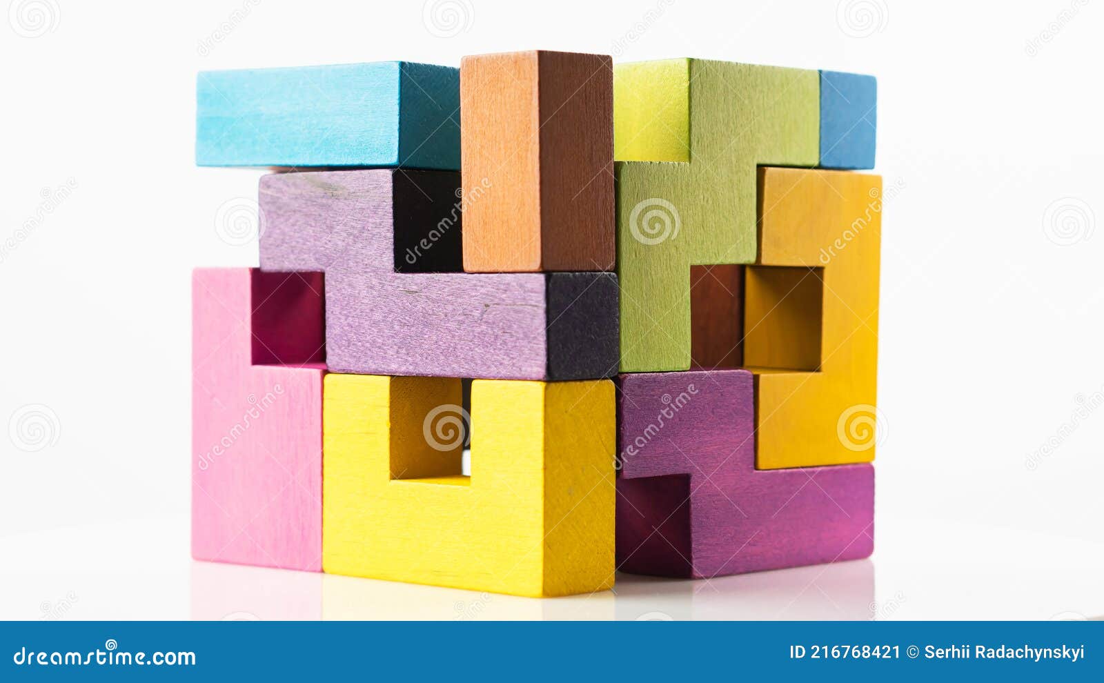 Cube Made of Multicolored Wooden Figures on a White Background. Stock ...