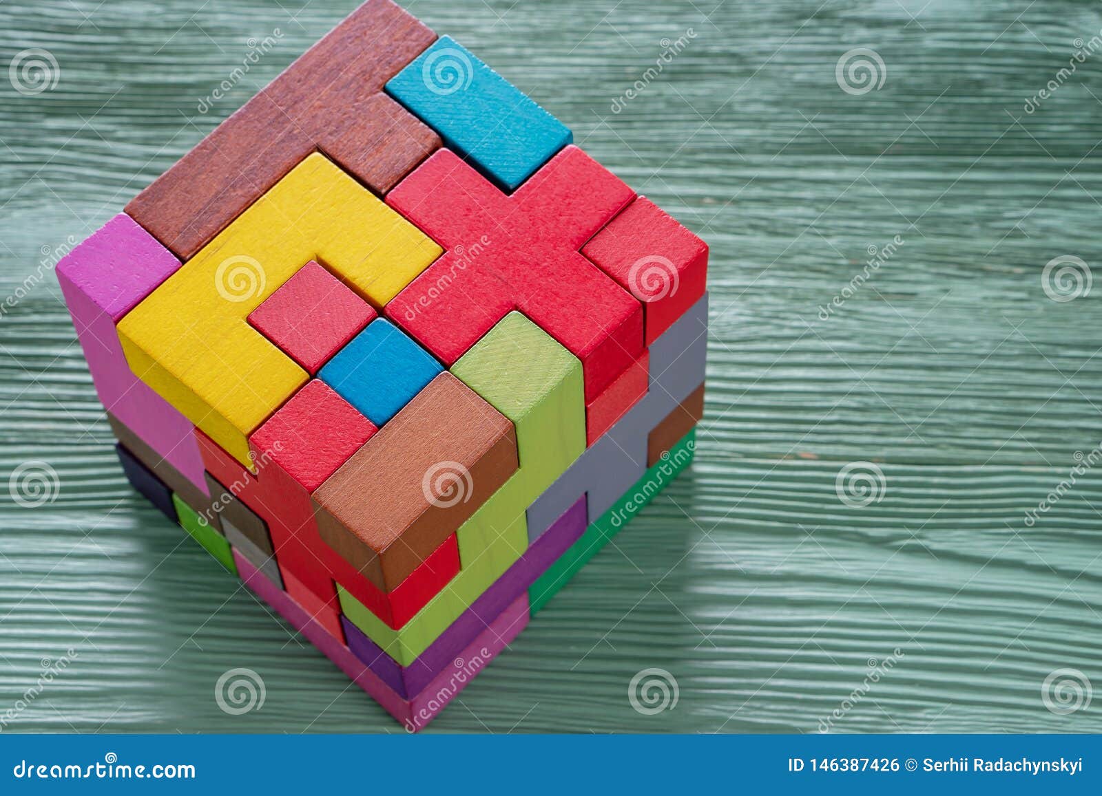The Cube is Made Up of Multi-colored Wooden Shapes Stock Photo - Image ...