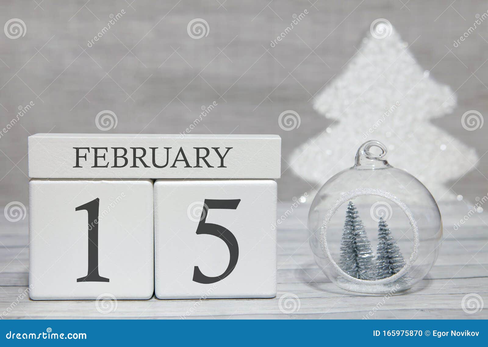 Cube Shape Calendar for February 15 on Wooden Surface and Light ...