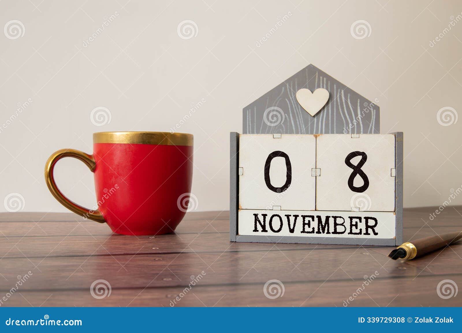 Cube Shape Calendar for NOVEMBER 8 and Computer Keyboard on Table ...