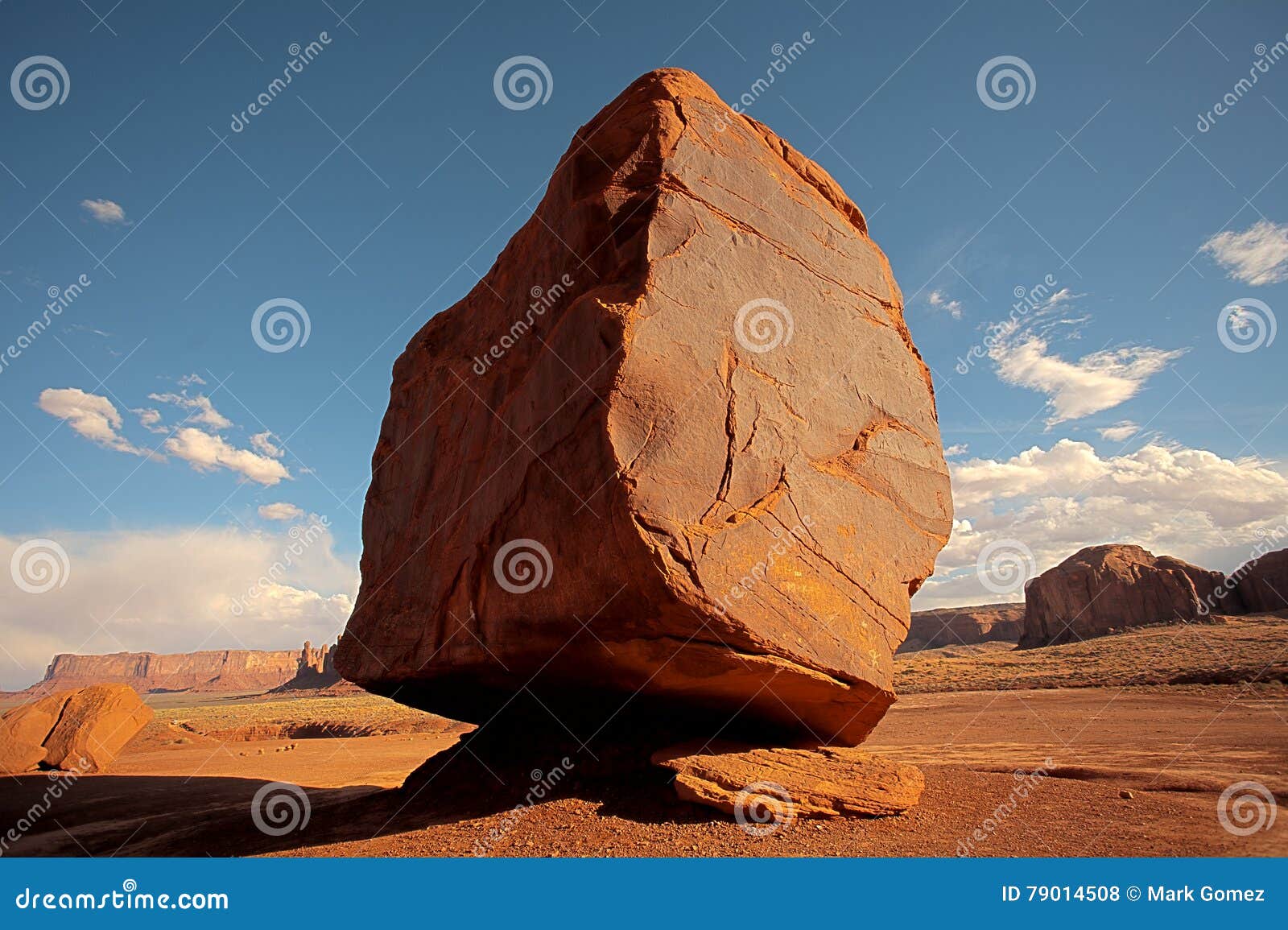 Cube Shaped Boulder in Front of a Desert Landscape Stock Photo - Image ...