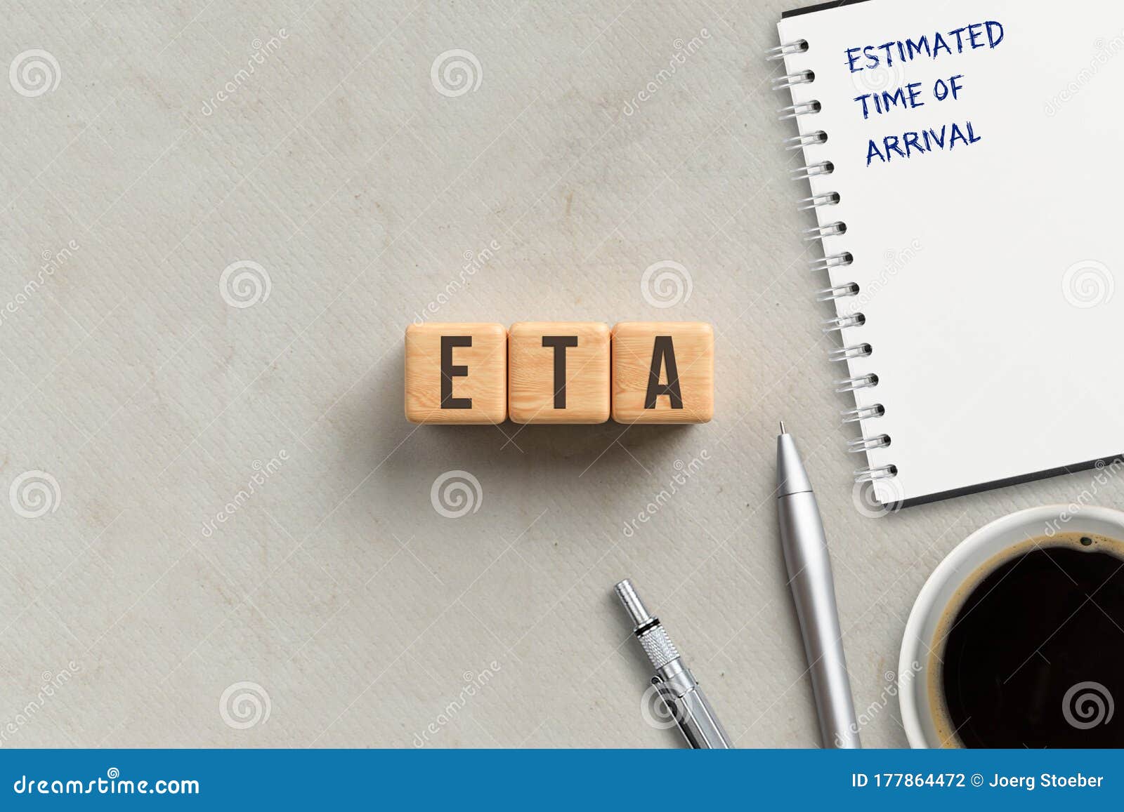 Cubes with Acronym ETA and Notepad with Explanation ESTIMATED TIME of ...