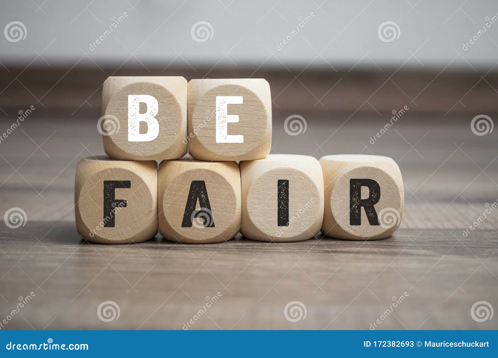 Cubes and Dice with Message Be Fair on Wooden Background Stock Image ...