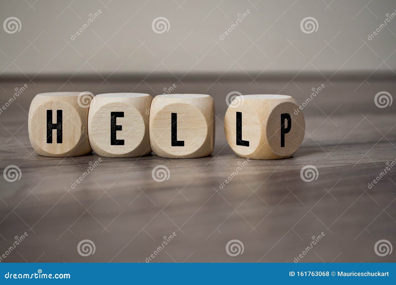 Cubes And Dice With The Words Hell And Help On Wooden Background Stock ...