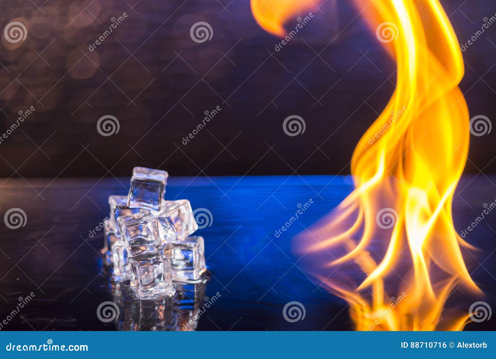 Cubes of Ice and Fire on a Water Surface on an Abstract Background ...