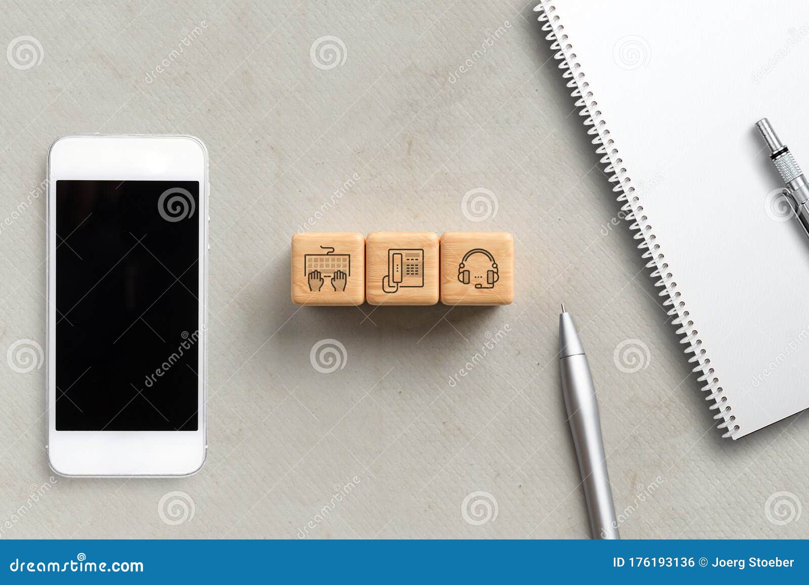 Cubes with Icons Symbolizing a Call Center Surrounded by a Smartphone ...