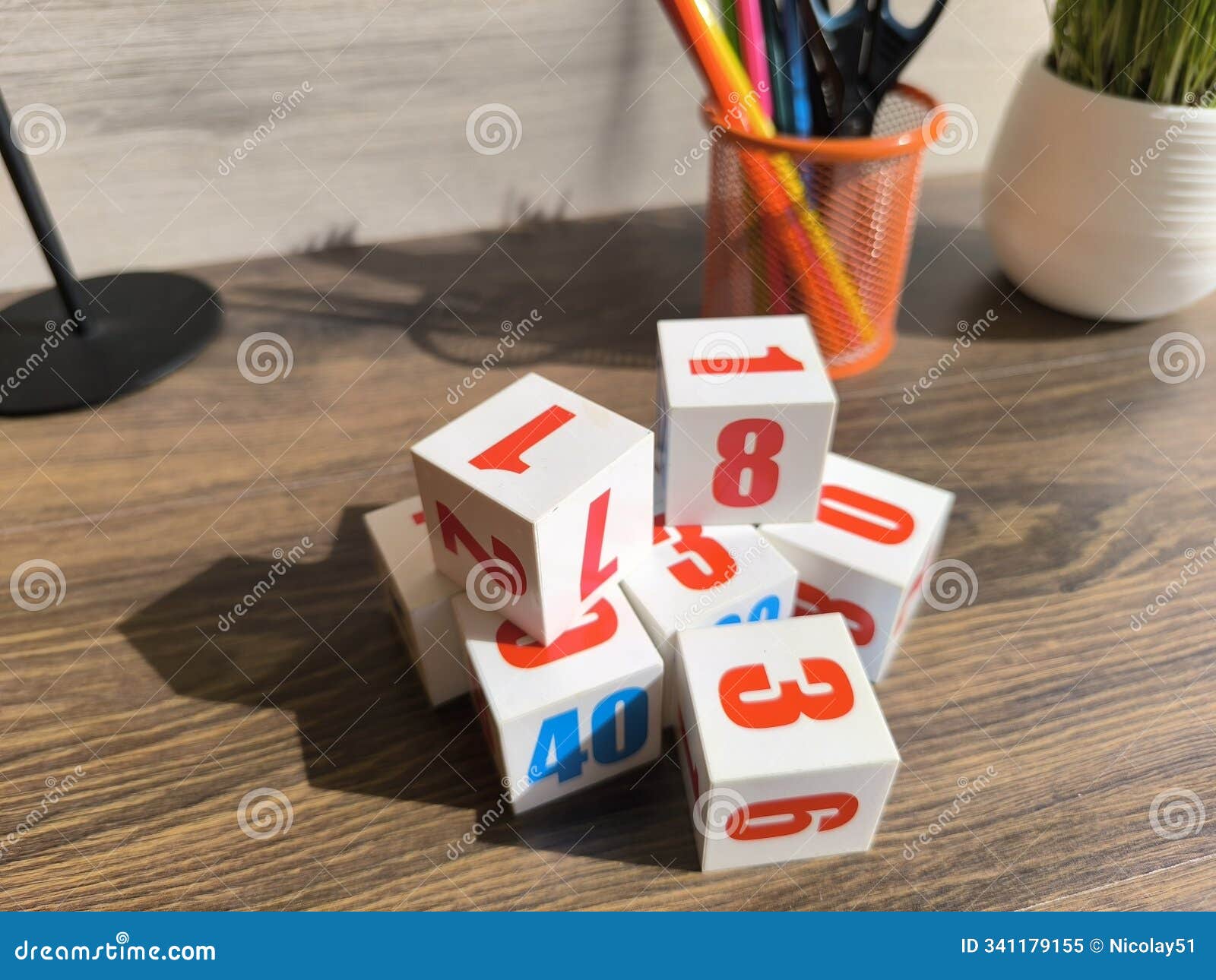 Cubes with Numbers on a Wooden Table Stock Image - Image of cube, date ...
