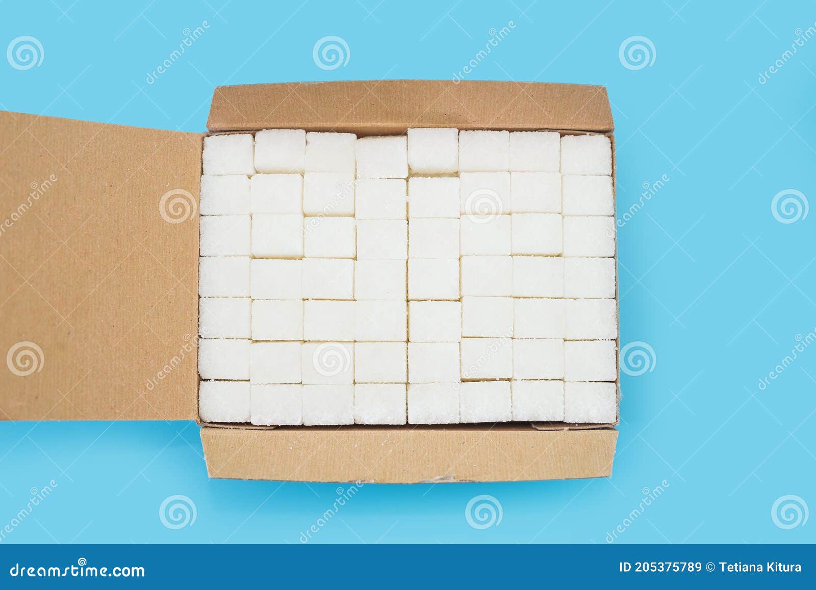 Cubes of White Sugar in a Box on a Blue Background Stock Image - Image ...