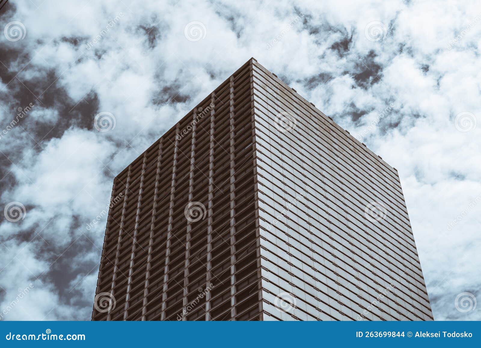 Cubic Building in a Cloudy Sky Stock Photo - Image of heavy, haze ...