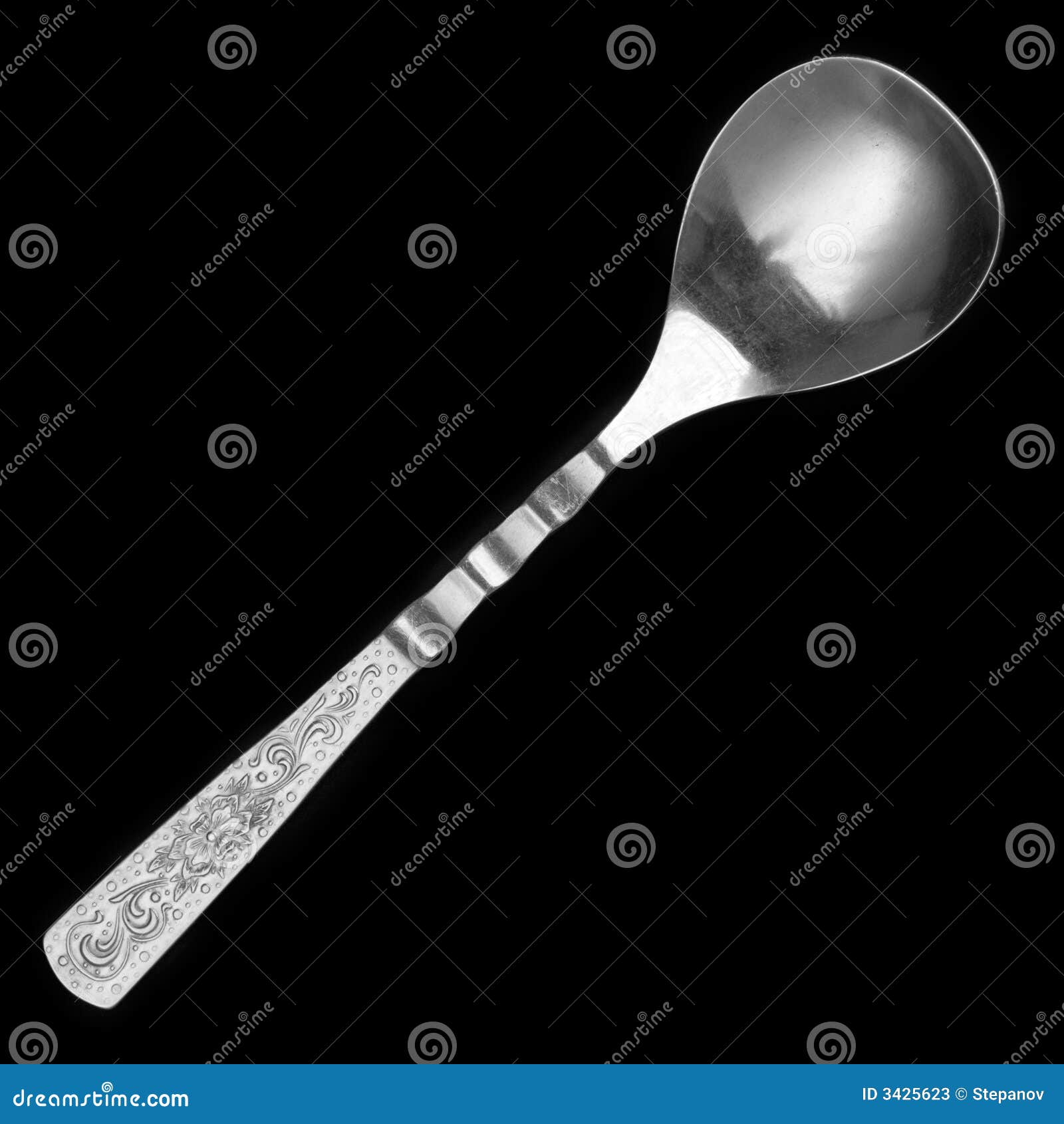 Cuchara del metal imagen de archivo. Imagen de sombra - 3425623