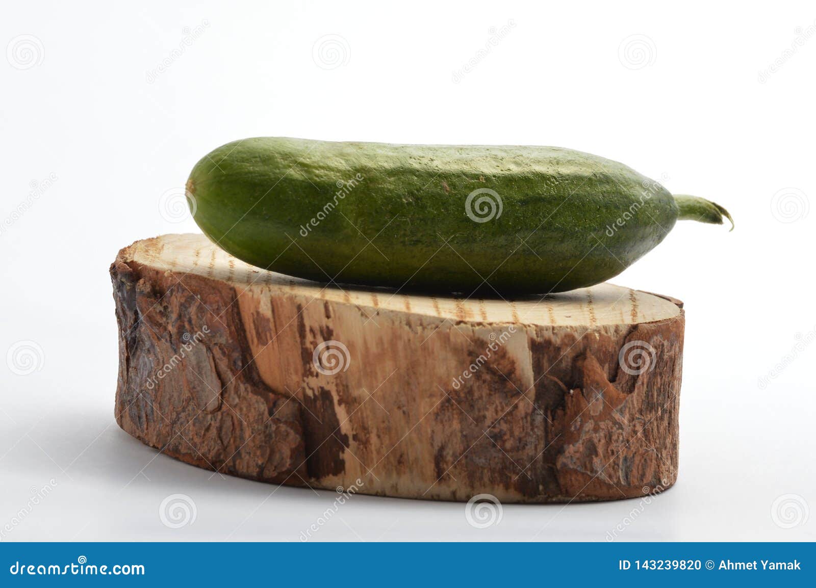 Cucumber on Circle Tree Slice Stock Photo - Image of small, food: 143239820