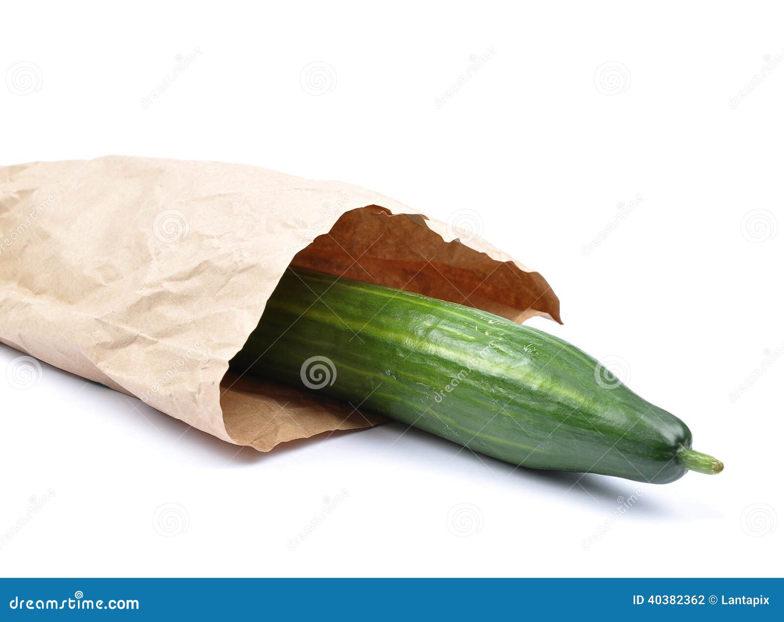 Cucumber in paper bag stock photo. Image of macro, organic - 40382362