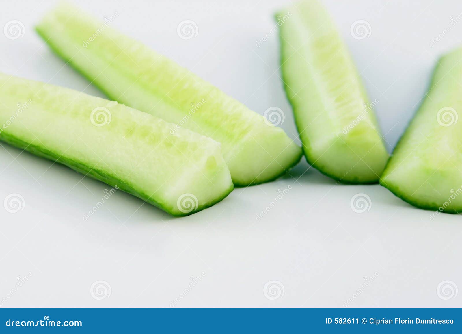 Cucumber pieces stock image. Image of cucumber, slces, pieces - 582611