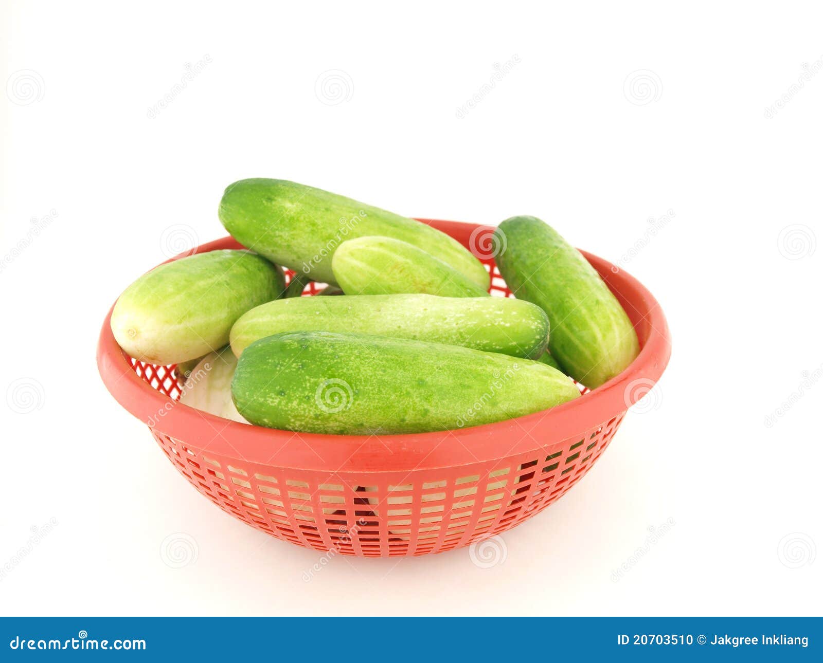 Cucumber on red basket stock photo. Image of closeup - 20703510