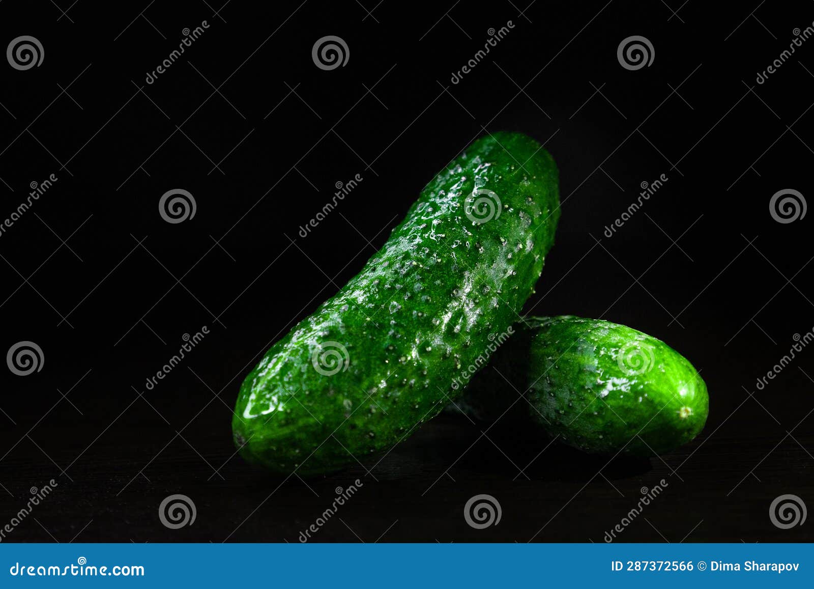 Cucumbers on a Black Background Stock Photo - Image of leaf, background ...