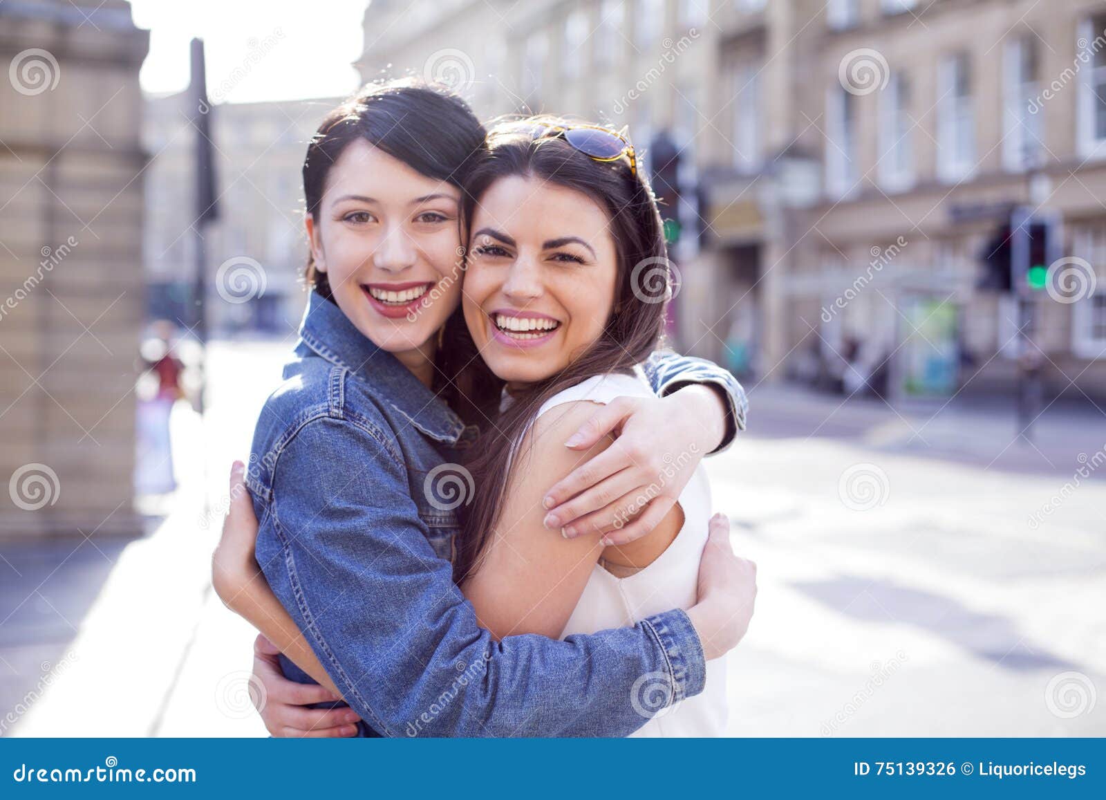 Cuddle in the city stock photo. Image of sunglasses, standing - 75139326