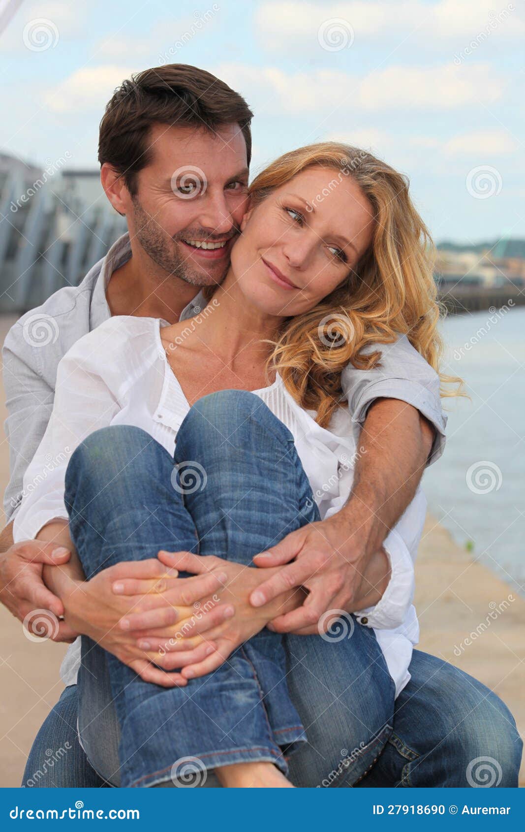 Cuddling on the beach stock photo. Image of 3034, outside - 27918690