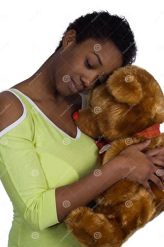 Cuddling with a teddy bear stock image. Image of face - 4595285