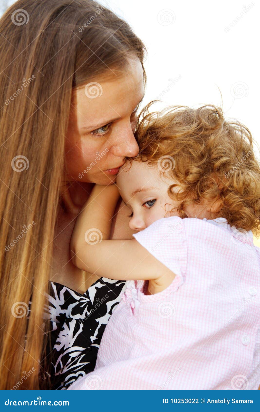 Cuddling up to mother stock photo. Image of female, cuddle - 10253022