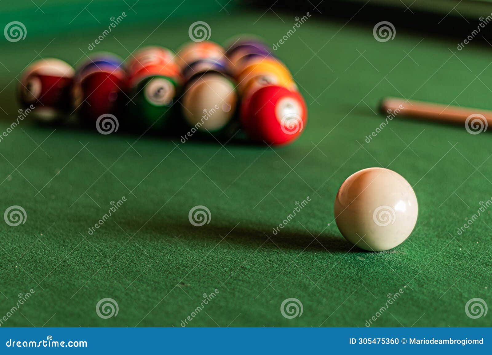Cue Ball in Focus with Billiard Balls in Triangle Formation Behind ...