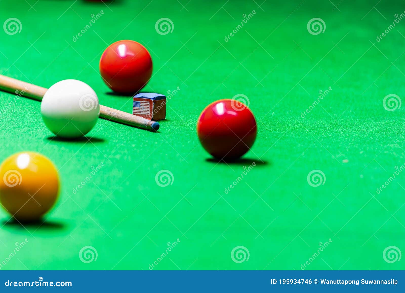 A Cue and Snooker Balls of Various Colors are Placed on the Snooker ...
