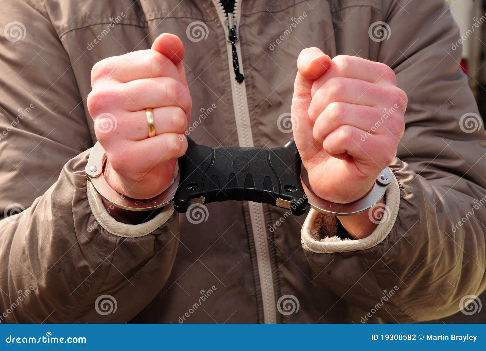Cuffed and Held. a Suspect Under Arrest Stock Photo - Image of criminal ...
