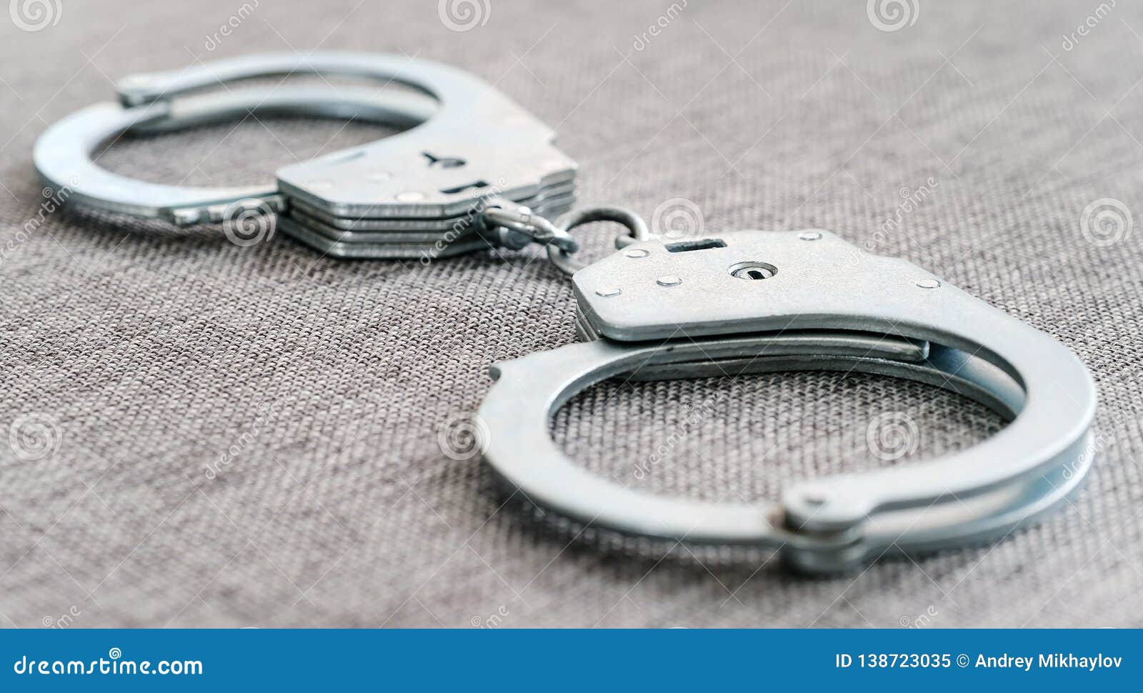 The Cuffs on the Table. Police Unit. Close-up Top View Selective Focus ...