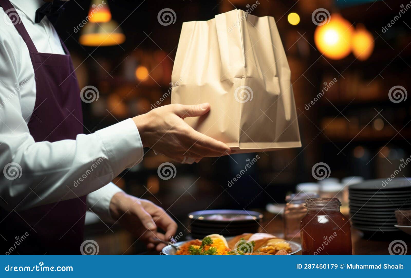 Culinary Exchange: Server Hands Over Dish To Contented Diner, Ensuring ...