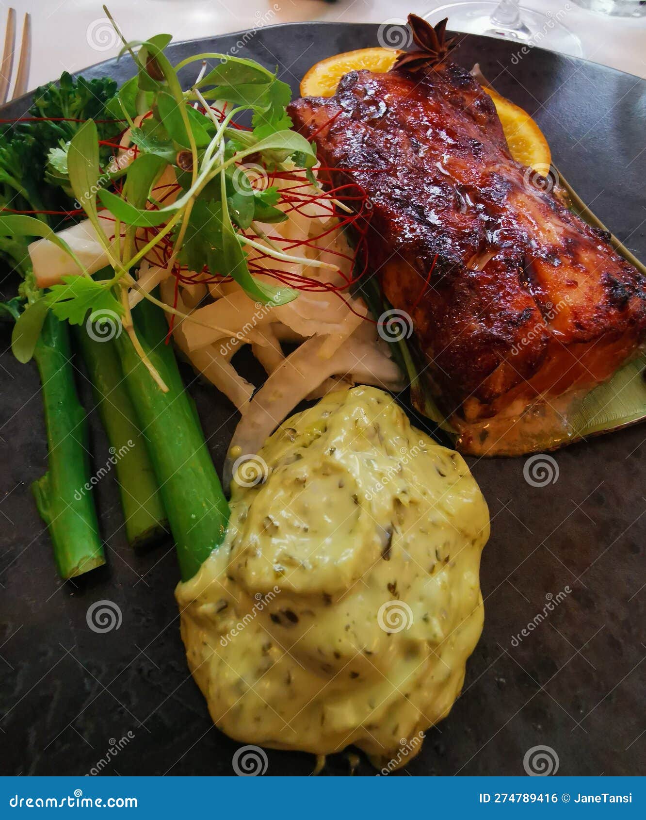 Culinary Image of Baked Cod with Hollandaise Sauce and Broccoli Stock ...