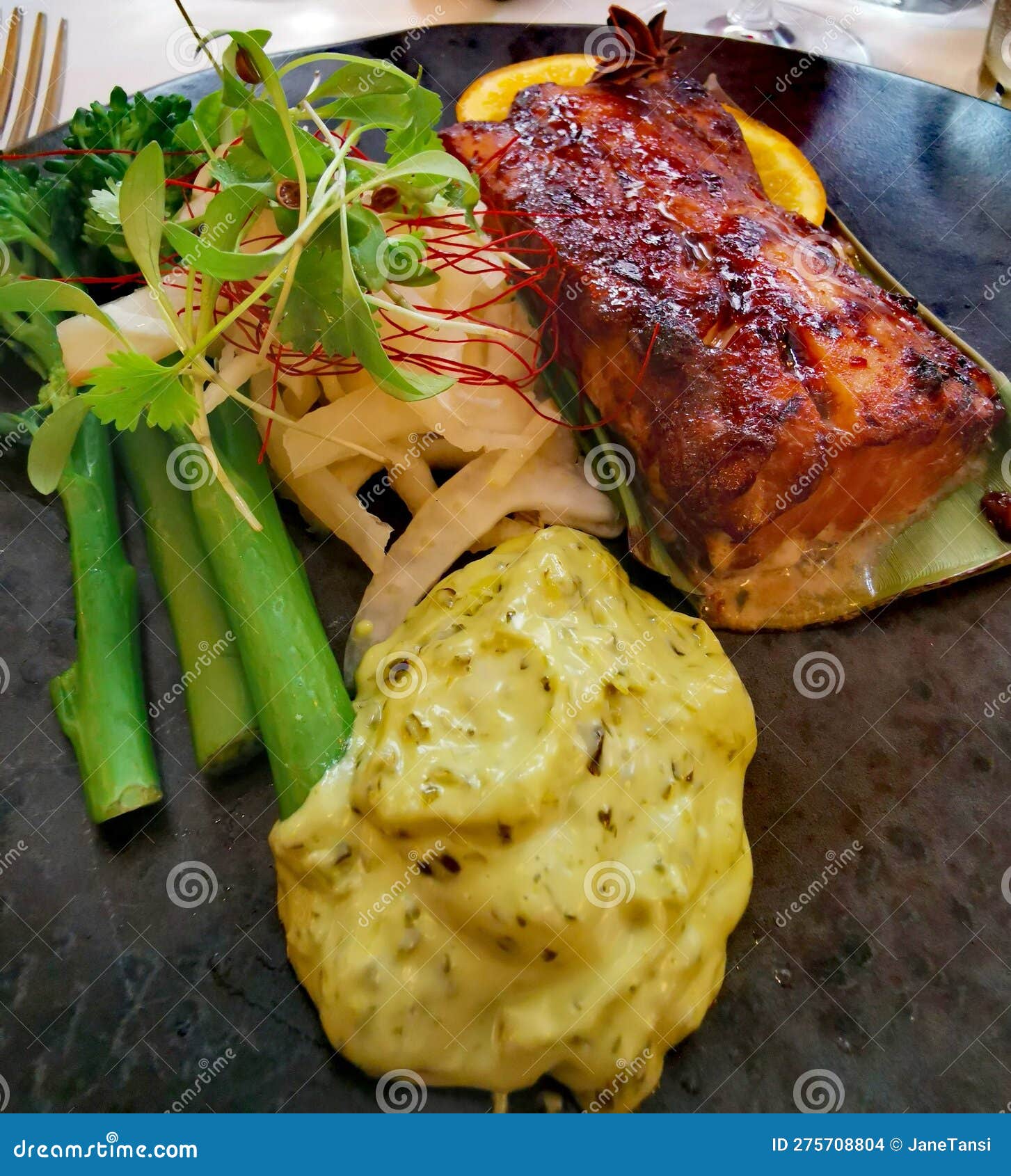 Culinary Image of Baked Cod with Hollandaise Sauce and Broccoli Stock ...