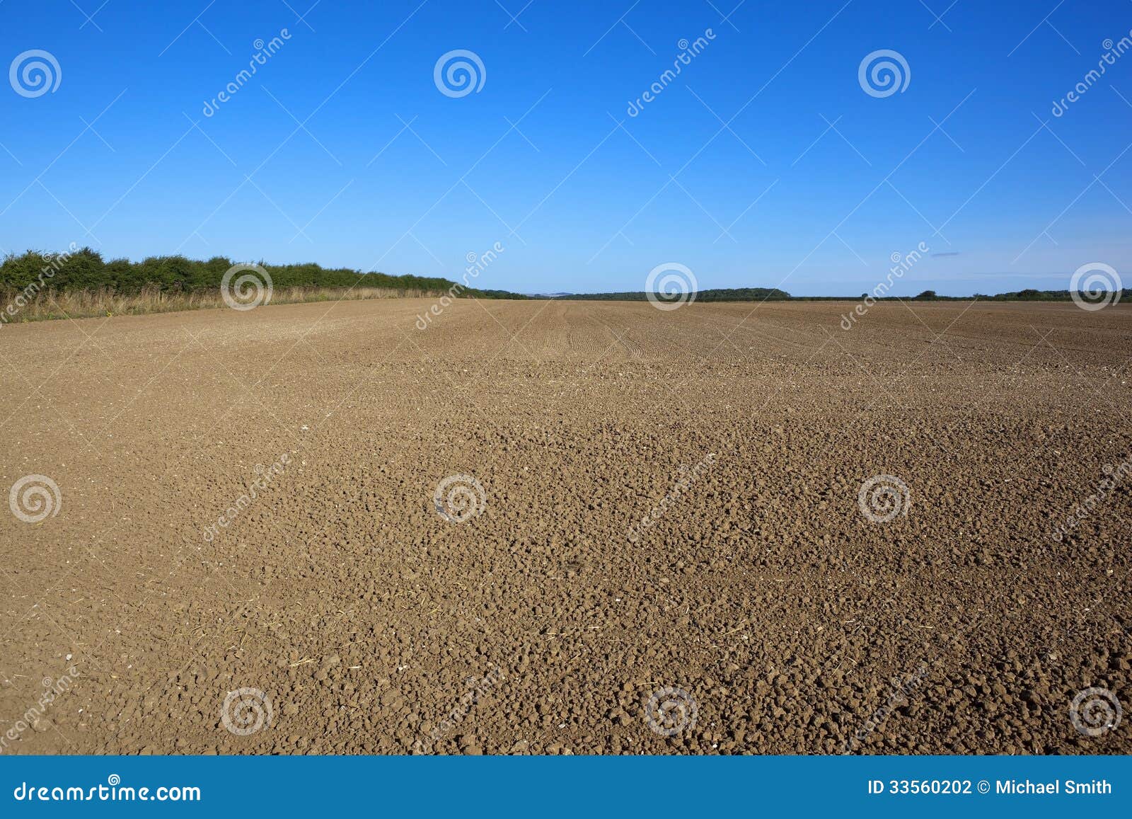 Cultivated arable field stock photo. Image of soil, farming - 33560202