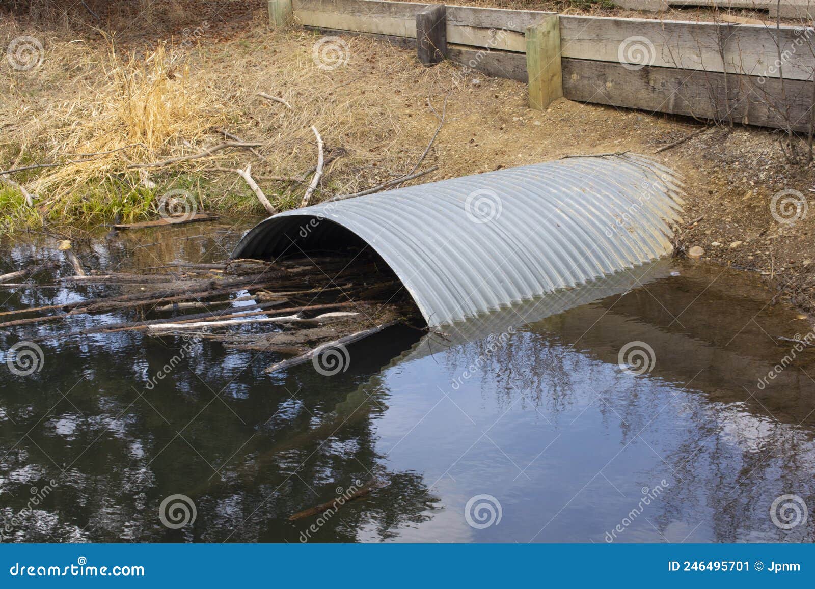 Culvert Pipe Under Road from Stream Oxbow in Park Stock Image - Image ...
