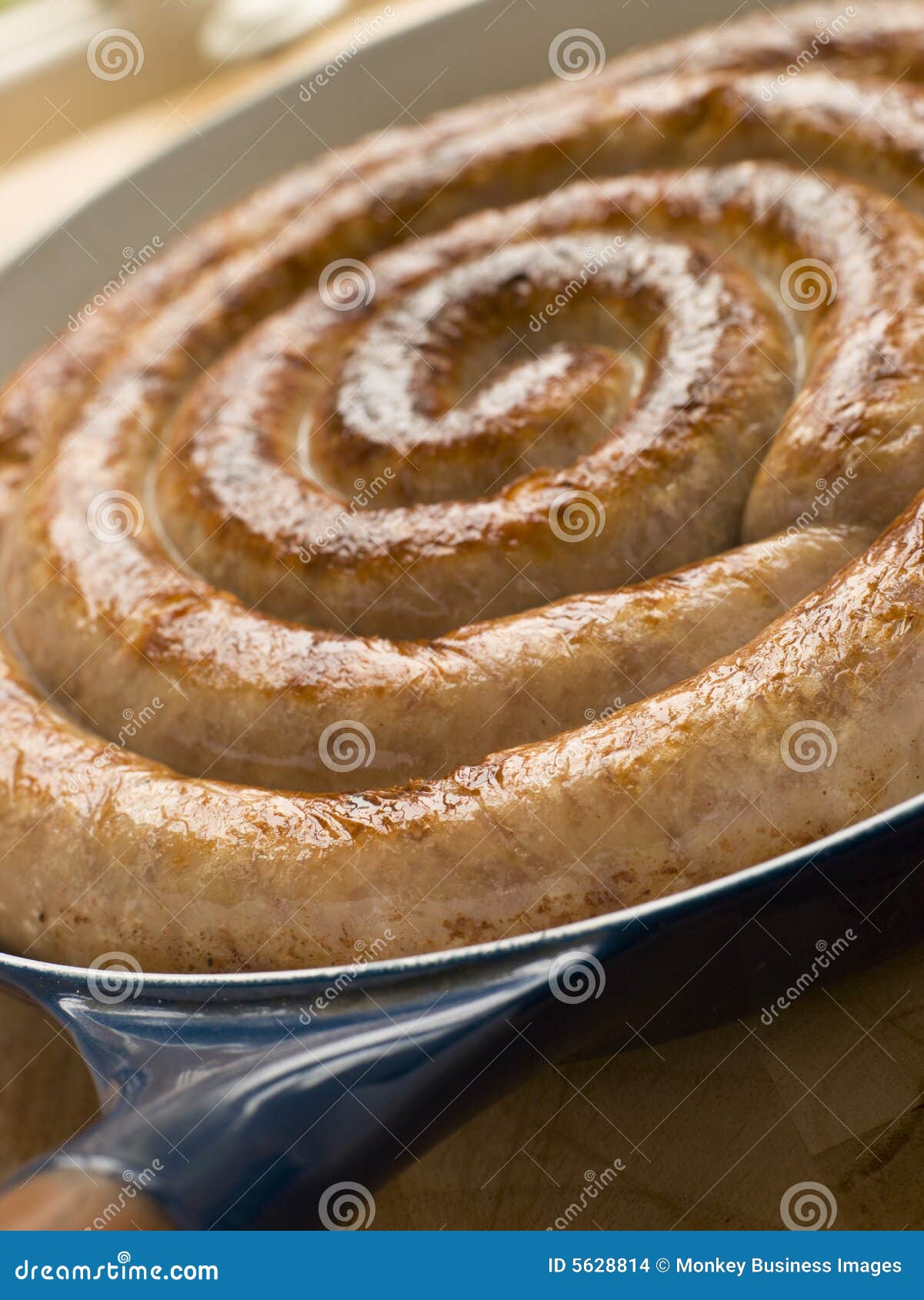 Cumberland Sausage Coil in a Frying Pan Stock Photo - Image of pork ...