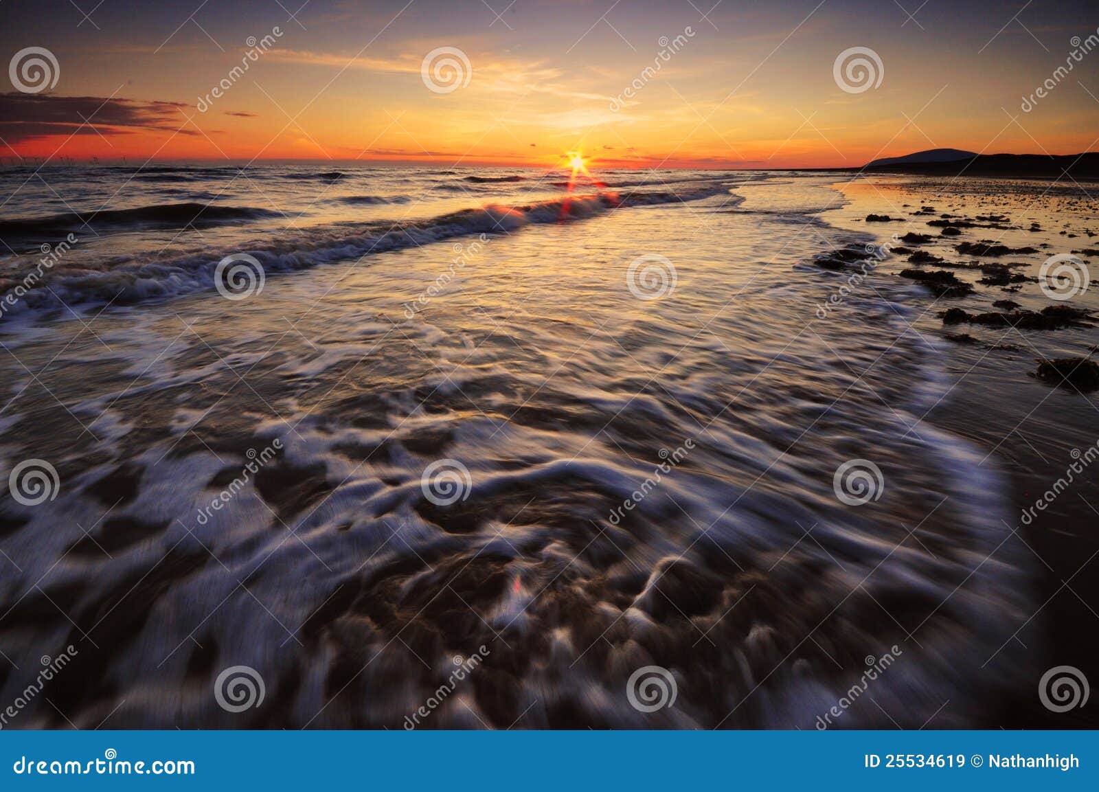 Cumbrian sunset stock image. Image of waves, water, clouds - 25534619