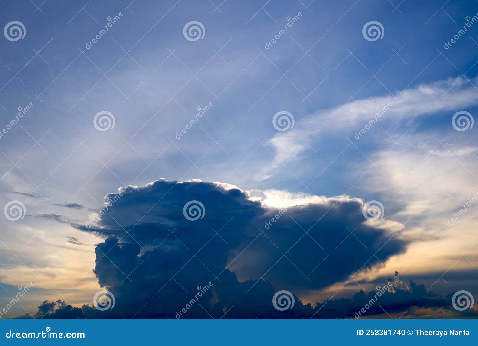 Cumulonimbus at sunset stock photo. Image of background - 258381740