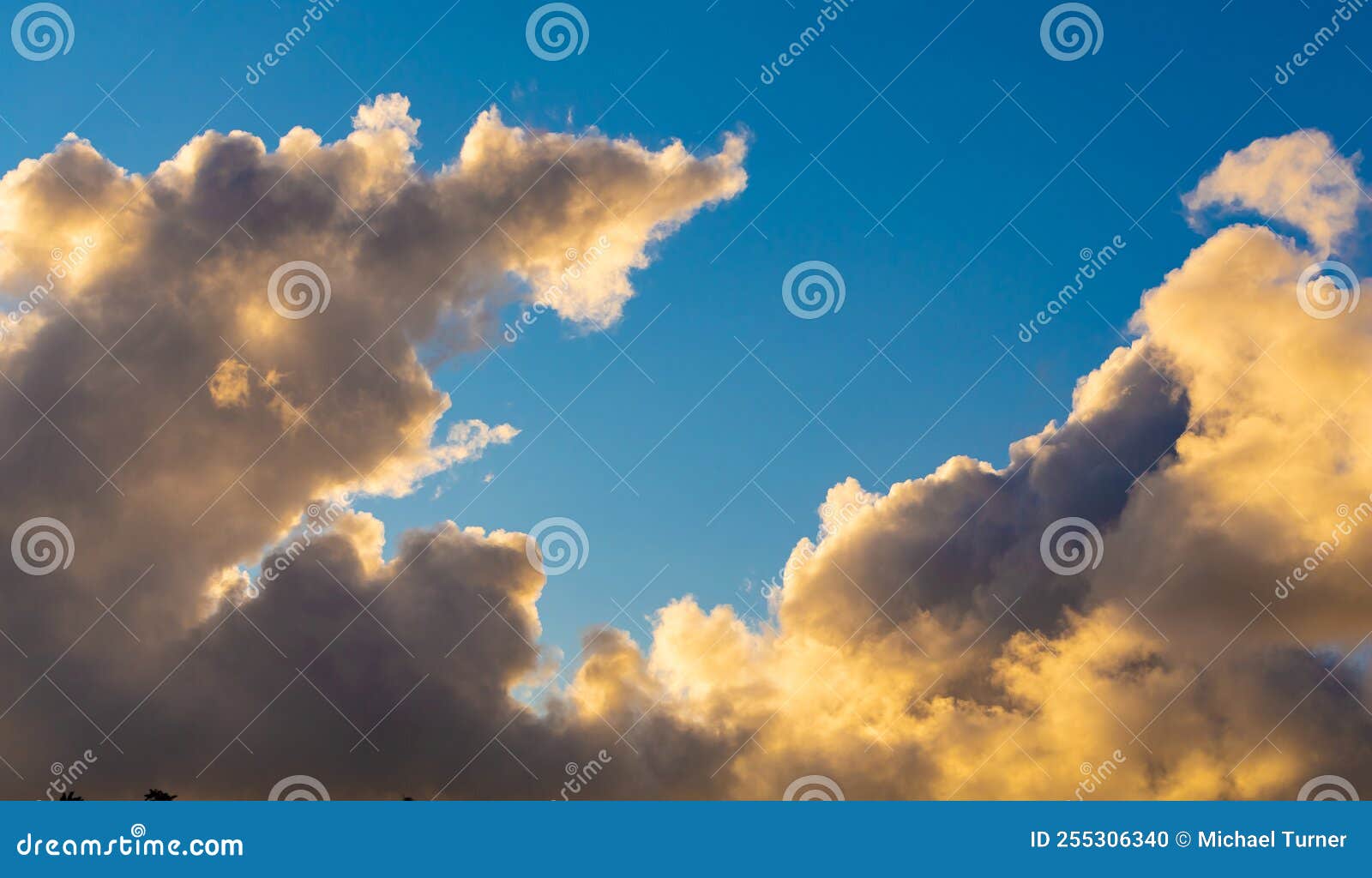 Cumulus and Stratus Clouds in Dramatic Sunset Sky Stock Photo - Image ...