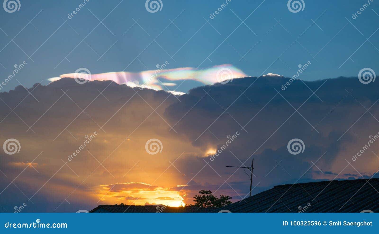 Cumulus Sunset Clouds with Sun Setting Down Stock Photo - Image of ...
