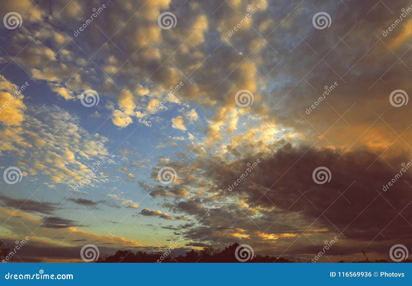 Cumulus Sunset Clouds with Sun Setting Down Dramatic Sunset Sky Toned ...