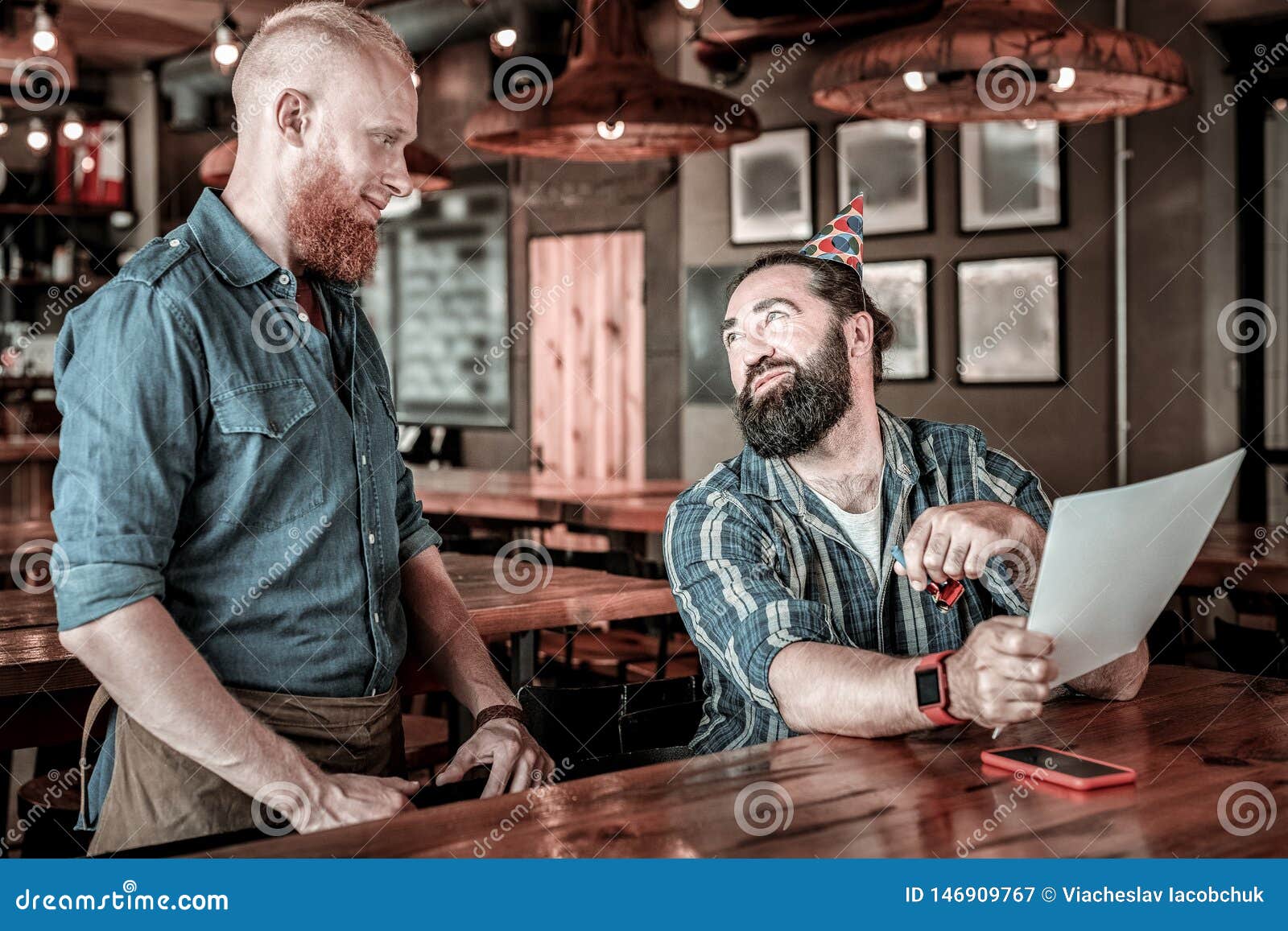 Cunningly Smiling Customer Going To Ask Waiter a Question. Stock Image ...