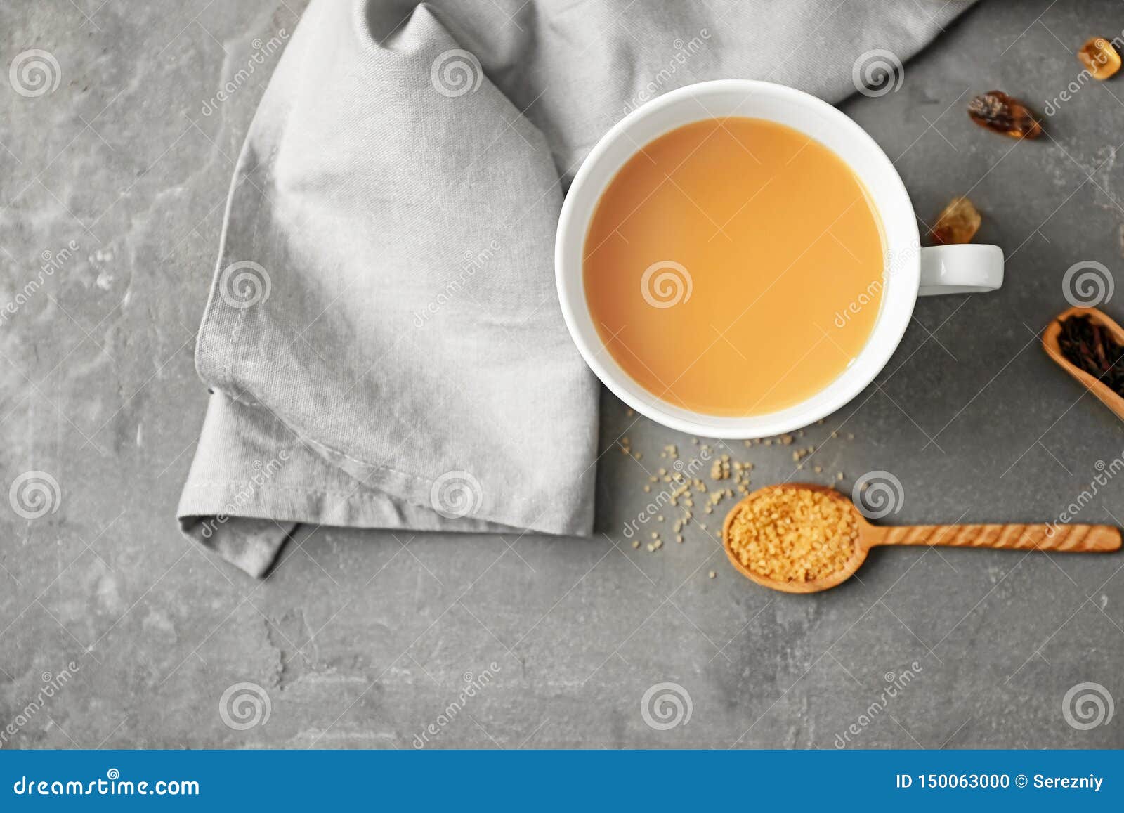 Cup of Aromatic Tea with Milk on Table, Top View Stock Photo - Image of ...