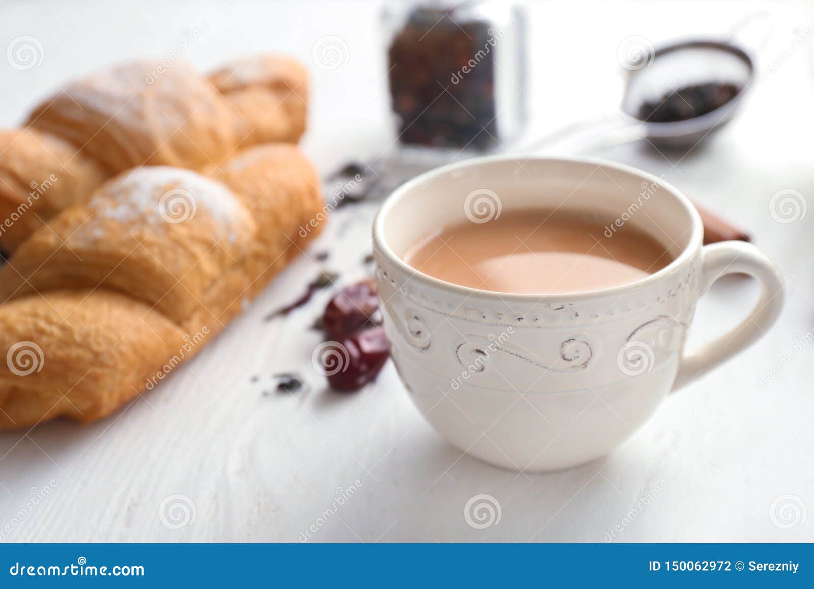 Cup of Aromatic Tea with Milk on Wooden Table Stock Photo - Image of ...