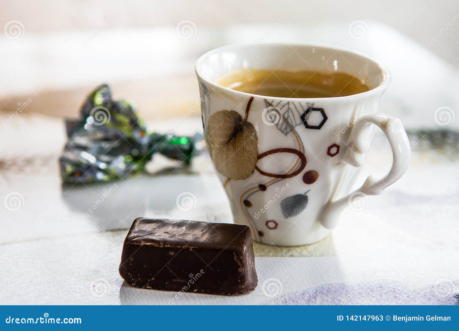 A Cup of Black Coffee with Chocolate Candy Stock Image - Image of black ...