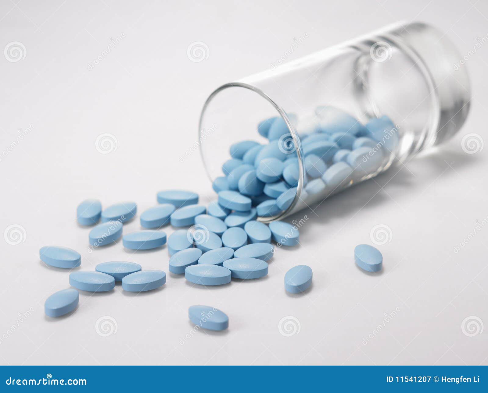 A cup of blue tablets stock image. Image of green, blue - 11541207