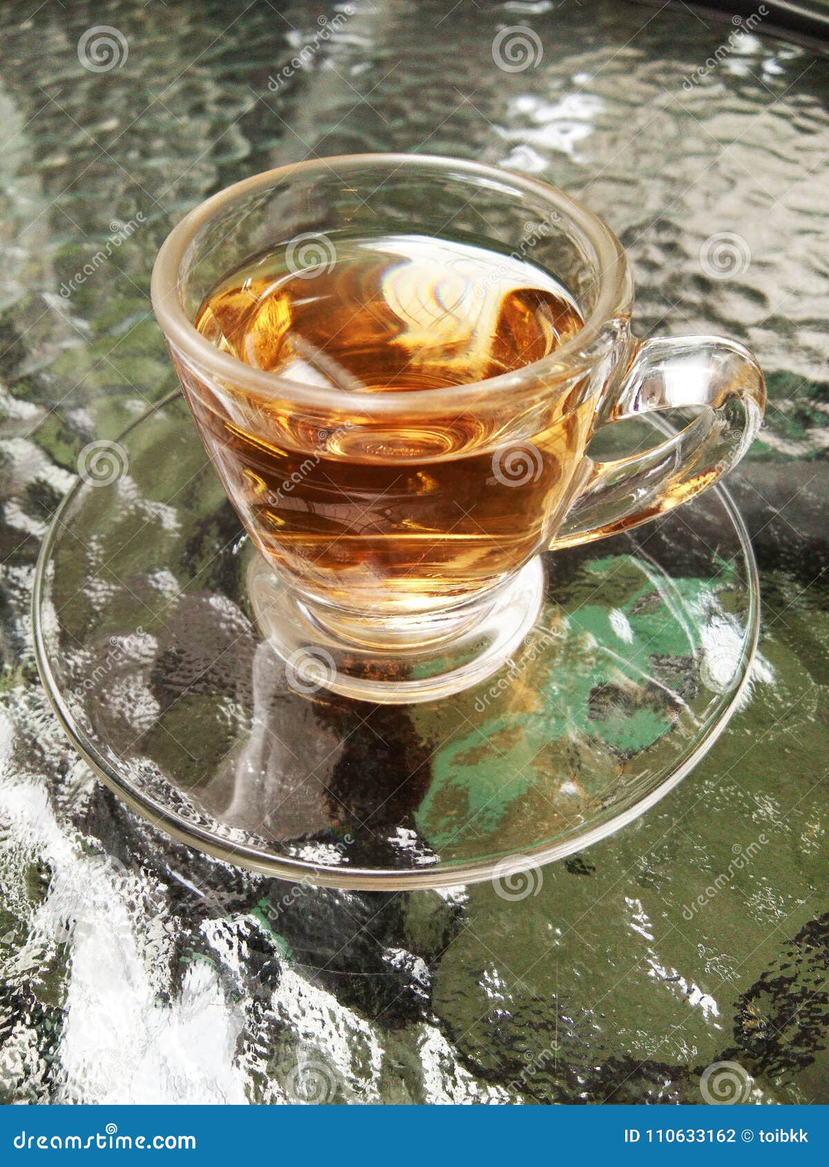Cup of brown tea stock photo. Image of table, tablen - 110633162
